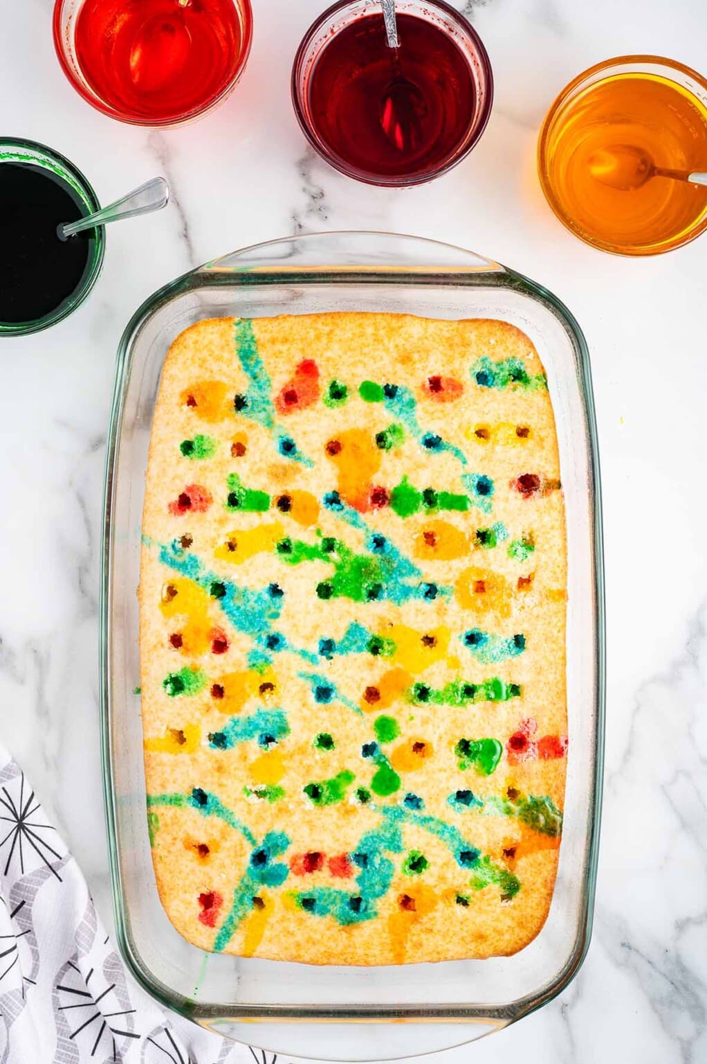 Rainbow Jello Poke Cake - Princess Pinky Girl